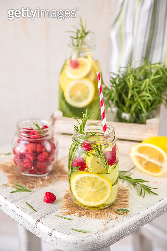 Infused Detox Water with lemon, cucumber, raspberry and rosemary ...