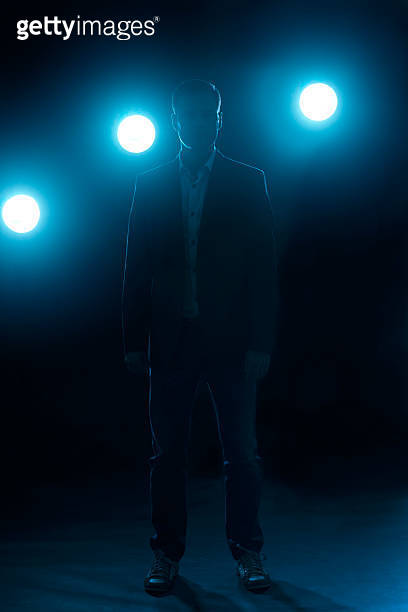 Back lit portrait of anonymous man standing up 이미지 (513548468) - 게티이미지뱅크