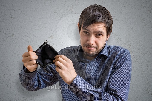 Bankruptcy and insolvency concept. Young man has no money and is ...