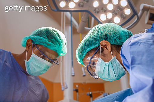 Healthcare and medical concept, Team surgeon at work in operating room ...