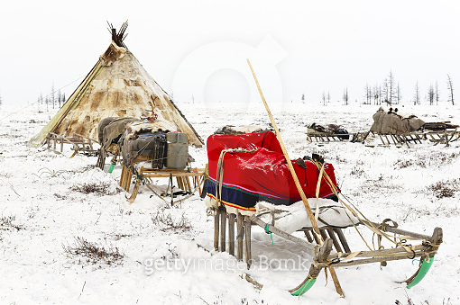 Camp of nomadic tribe in the polar tundra at a frosty day. (666315002 ...