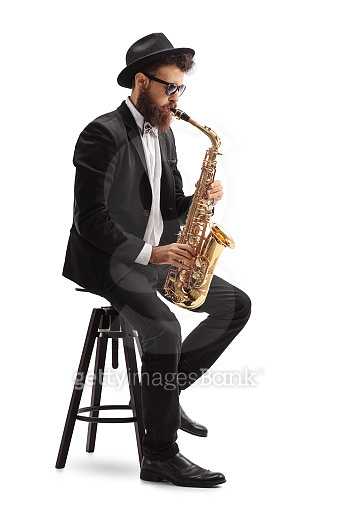 Jazz musician playing saxophone and sitting on chair 이미지 (685569088 ...
