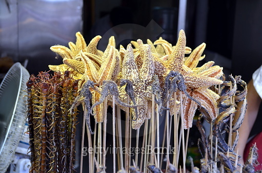 Fried starfish and fried Seahorse - China traditional food at ...