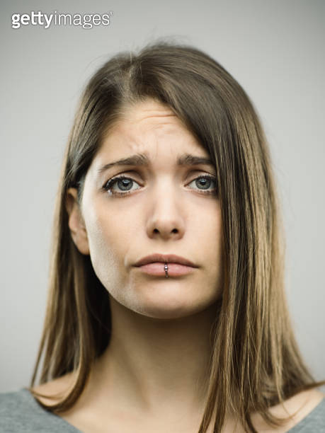 Close-up portrait of sad beautiful young woman 이미지 (692865282) - 게티이미지뱅크
