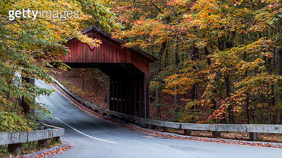 Covered bridge on a scenic drive Traverse City in autumn (803406670 ...