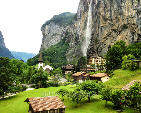 Beautiful Staubbachfall waterfall flowing down the picturesque ...