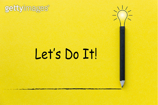 Let do it word with black pencil on yellow background with light bulb ...