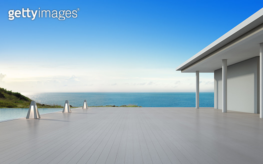 Sea view swimming pool and empty big terrace in modern luxury beach ...