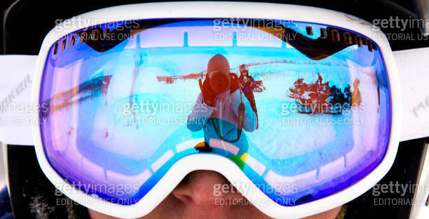 Reflection in Ski Goggles close up . Mountain pass in Khibiny Mountains ...
