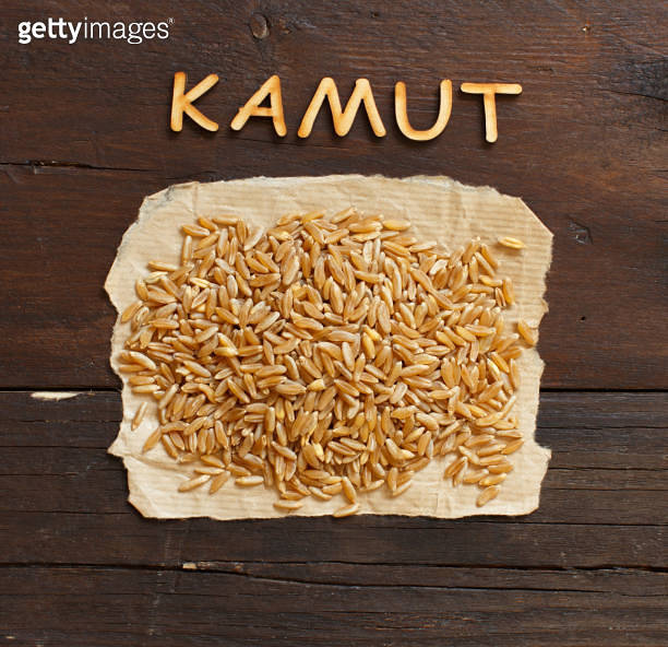 Pile of Kamut grain with wooden letters 이미지 (881874852) - 게티이미지뱅크