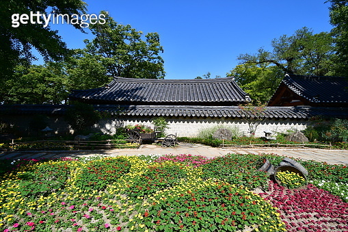 Stone road and flower garden at Gyeonggijeon Hall in Jeonju Korean ...
