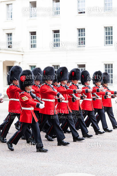 Ceremonial changing of the London guards in front of the Buckingham ...