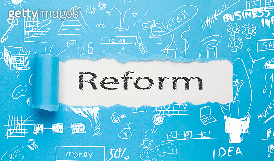 reform text written paper on blue background 이미지 (871300890) - 게티이미지뱅크