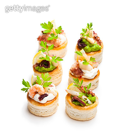 Vol-au-vents puff pastry cases filled with salted squid and octopus ...