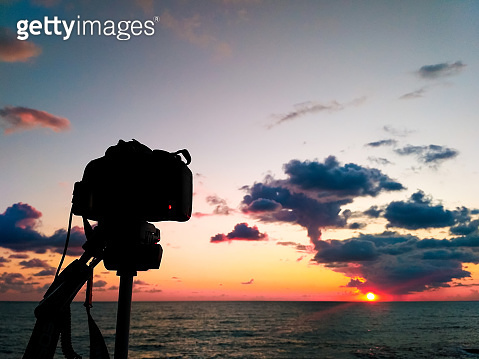 Dslr camera photographing Tuscany hills. Dslr camera shooting on a ...