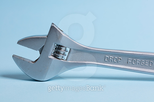 An adjustable spanner or adjustable wrench, French key, Crescent wrench ...