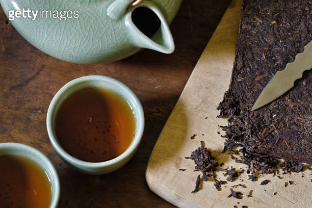 Preparing and Serving Chinese Compressed Brick Tea from Celadon Tea ...