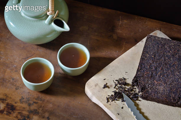 Preparing and Serving Chinese Compressed Brick Tea from Celadon Tea ...