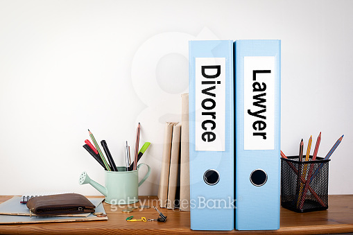 Divorce and Lawyer binders in the office. Stationery on a wooden shelf ...