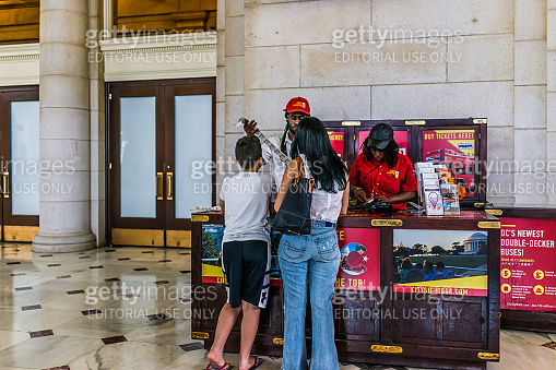 Inside Union Station in capital city with transportation signs and ...
