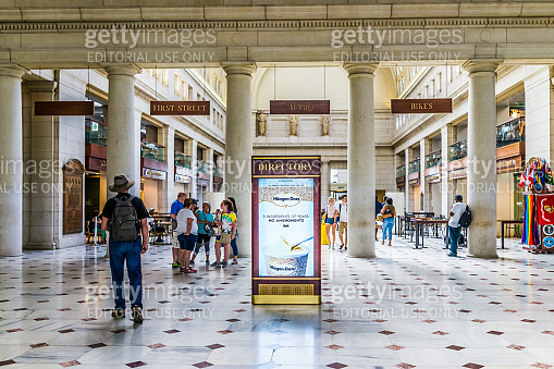 Inside Union Station in capital city with transportation signs and ...