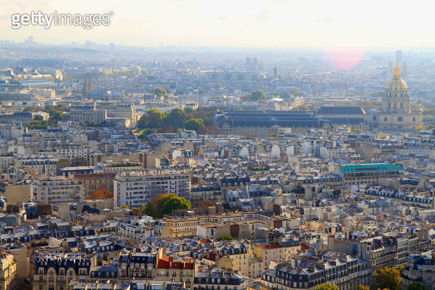 Above Paris idyllic Urban Skyline roofs: majestic Invalides golden dome ...