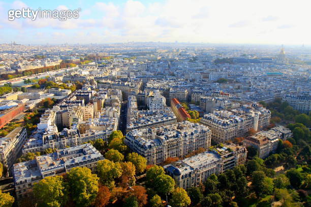 Above Paris idyllic Urban Skyline roofs: majestic buildings illuminated ...