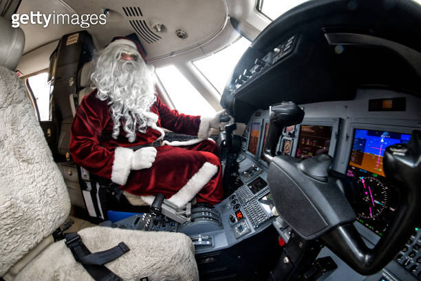 Santa Claus in private jet airplane 이미지 (896190216) - 게티이미지뱅크