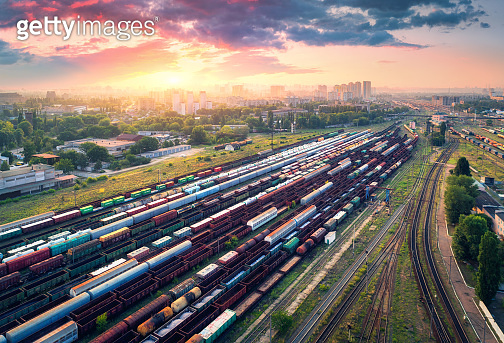 Cargo trains. Aerial view of colorful freight trains. Railway station ...