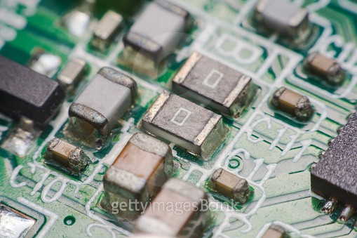 Closeup electronic hardware .Resistor and condensers assembly on the ...