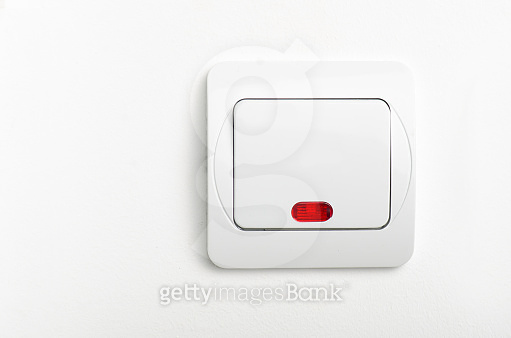 Light switch with red led on white wall (865022784) - 게티이미지뱅크