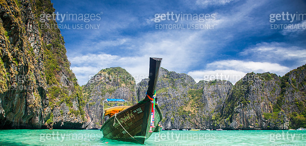 KO PHI PHI, THAILAND, February 1, 2014: Traditional long tail boats on ...