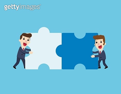 Business concept. Teamwork metaphor. Businessman connecting puzzle ...