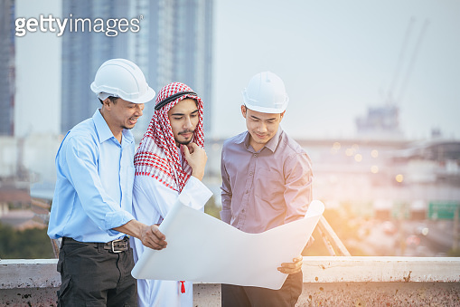 Muslim Business and Engineer working concept: two engineers and muslim ...