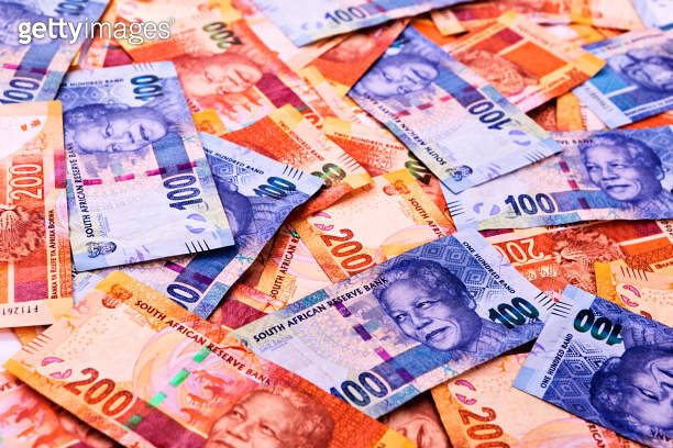 Many South African One- and Two-Hundred Rand banknotes, closeup ...