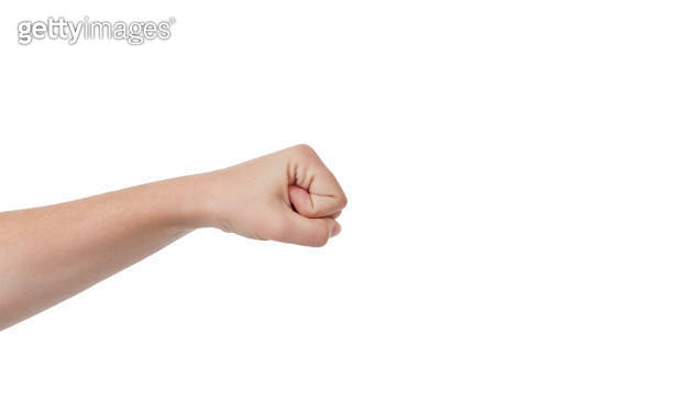 Clenched left hand extended for fist bump 이미지 (886551004) - 게티이미지뱅크
