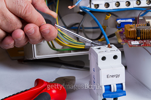 electrician fixing electrical devices with different tools 이미지 ...