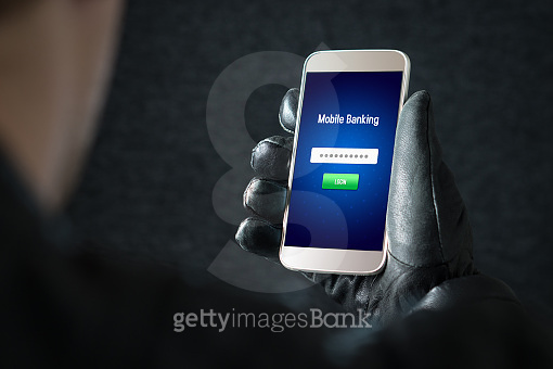 Mobile banking hack and cyber security concept. Hacker and criminal ...