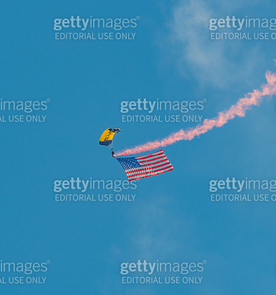 US Navy Seal Parachute Team-Leap Frogs in the sky over San Francisco Ca ...