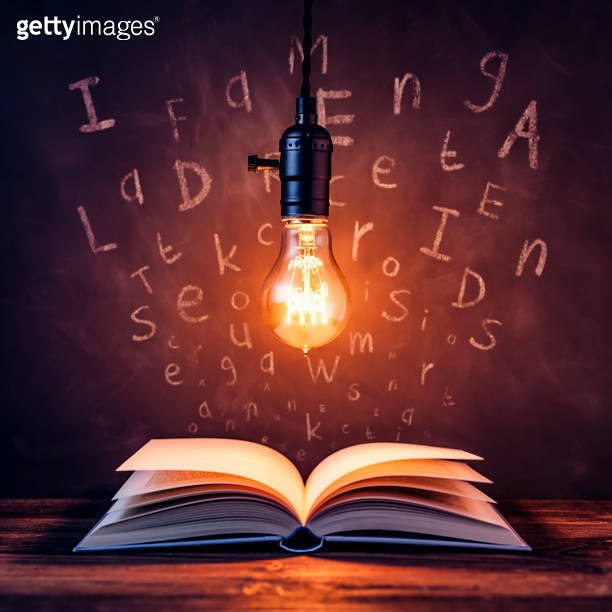 Light bulb, book and flying letters - Idea Blackboard Vintage Learning ...