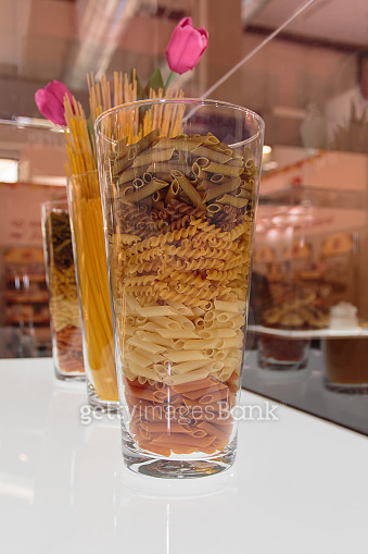 Colorful Italian Pasta Assortment inside Glass Vases with Pink Rose 이미지 ...
