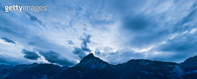 The wind over the mountains and the lake brought cumulus and ...