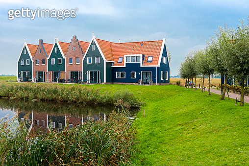 Volendam is a town in North Holland in the Netherlands. Colored houses ...