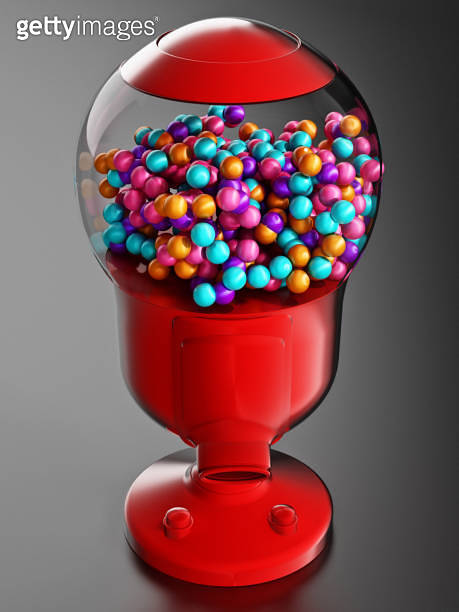 Red old-fashioned candy dispenser full of multi-colored candy/bubble ...