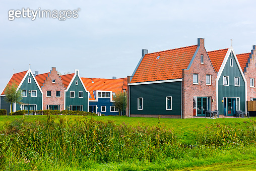 Volendam is a town in North Holland in the Netherlands. Colored houses ...