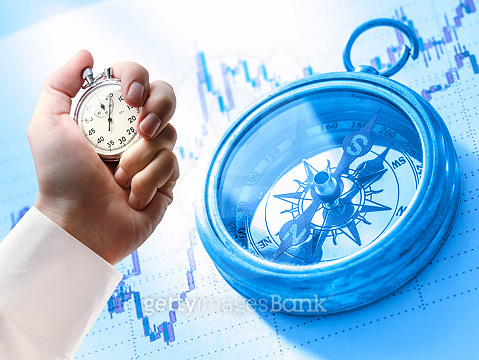 Candlestick chart, compass and stopwatch in male hand 이미지 (679737426 ...