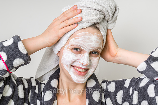 Woman applying natural facial mask from sour cream 이미지 (648781574) - 게티 ...