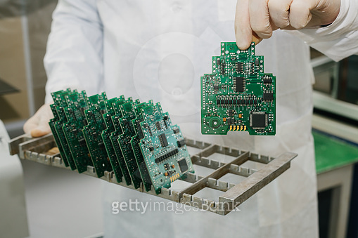 Microchip production factory. Technological process. Assembling the ...