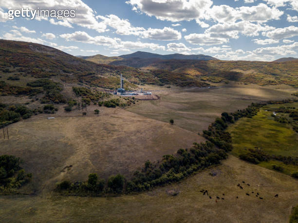 Aerial View of a Fracking Drilling Rig in the Autumn Mountains of ...