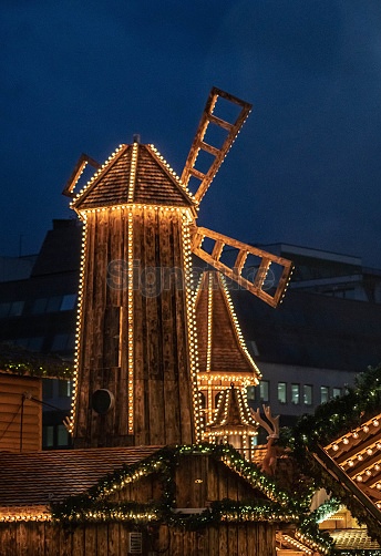 Windmill on an outdoor Christmas market stall selling Gluwein ...